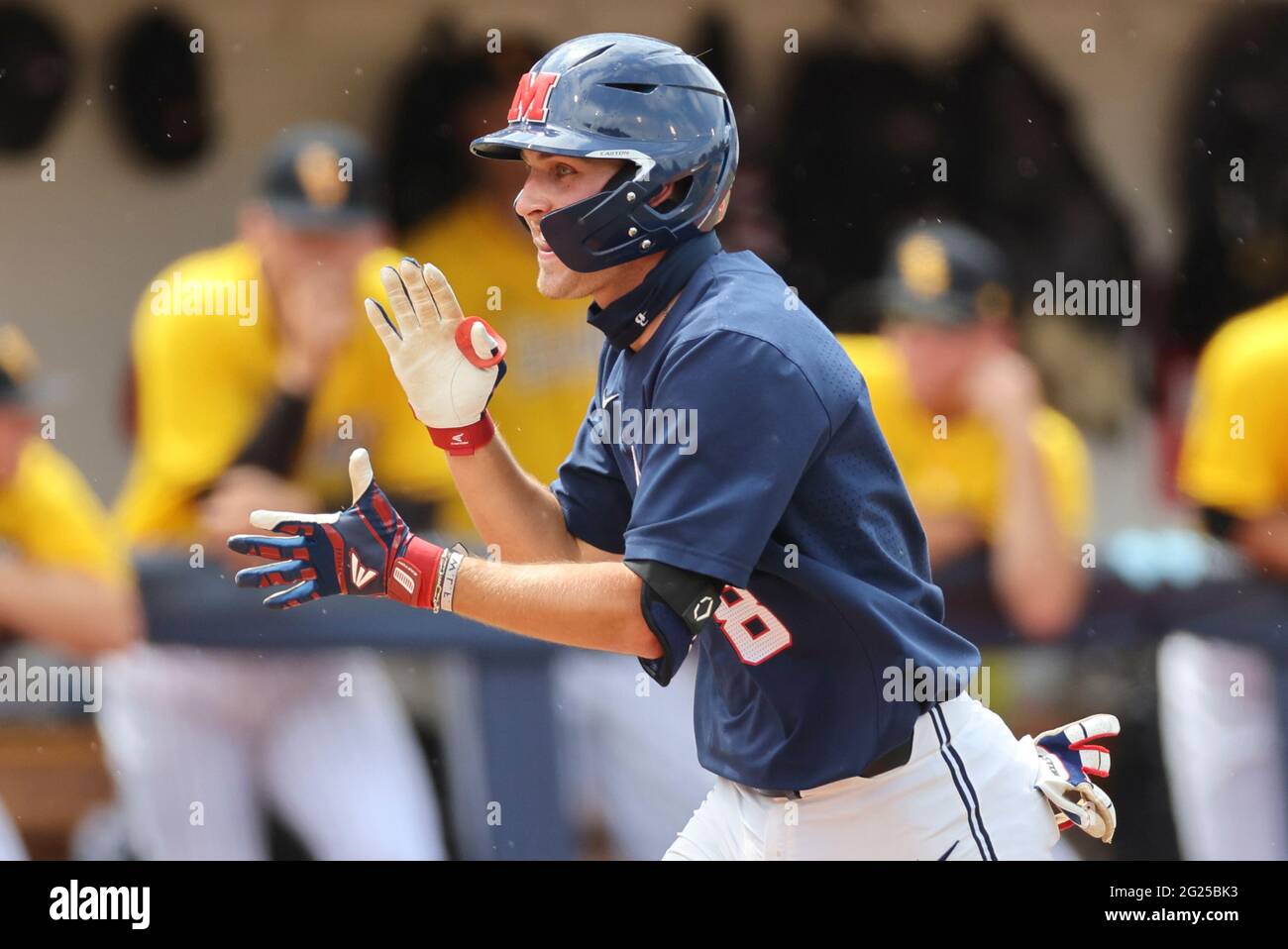 June 07, 2021: Ole Miss infielder Justin Bench (8) heads to home plate ...