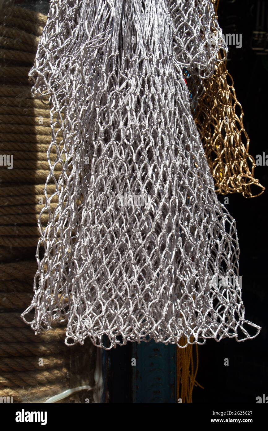 Metallic and golden fishing nets Stock Photo - Alamy