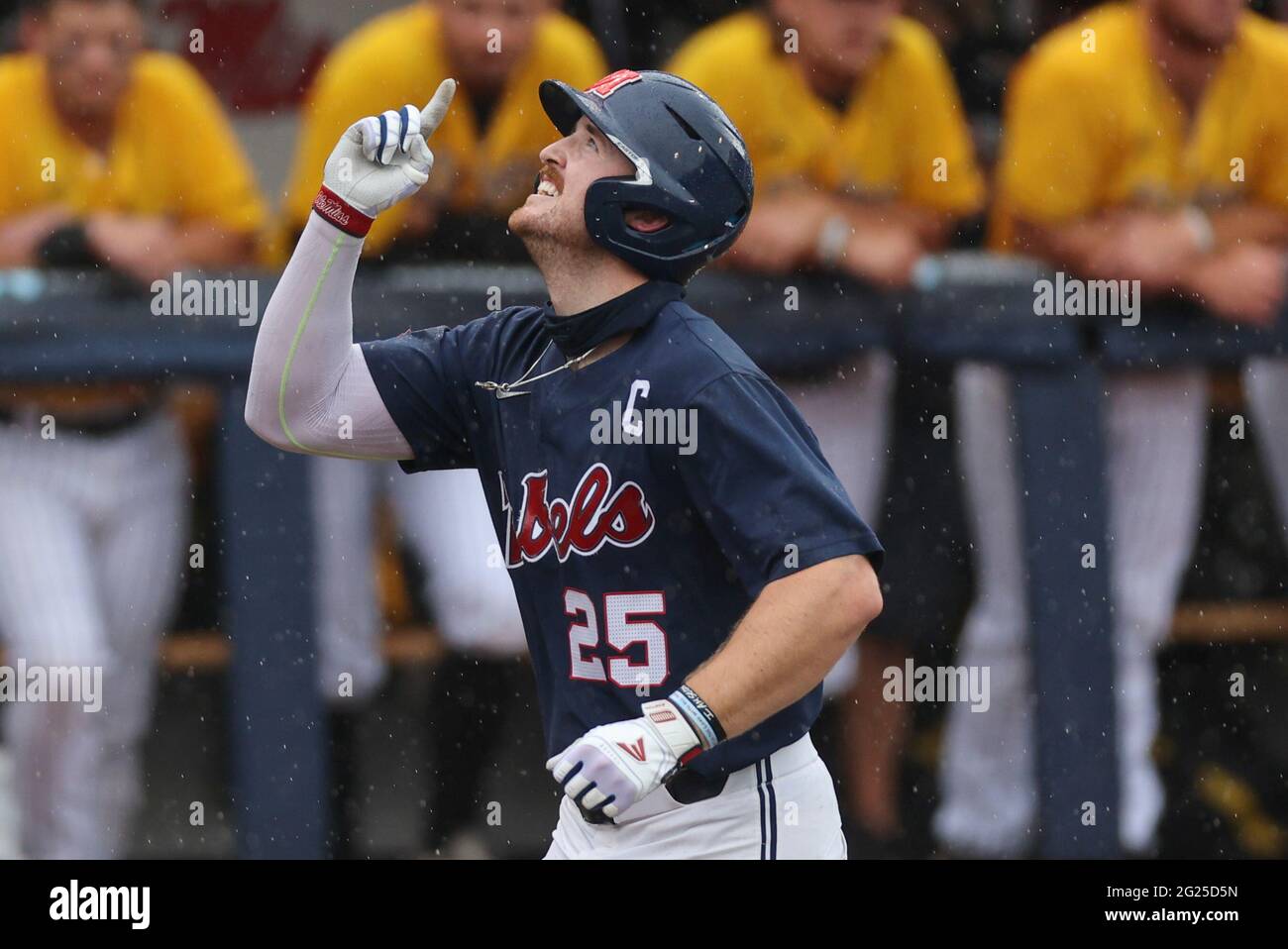 June 07, 2021: Ole Miss infielder Tim Elko (25) celebrates hitting a ...