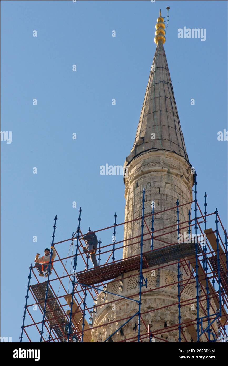Minaret with scaffold and workers. Sultan Ahmed Mosque (Turkish: Sultan ...