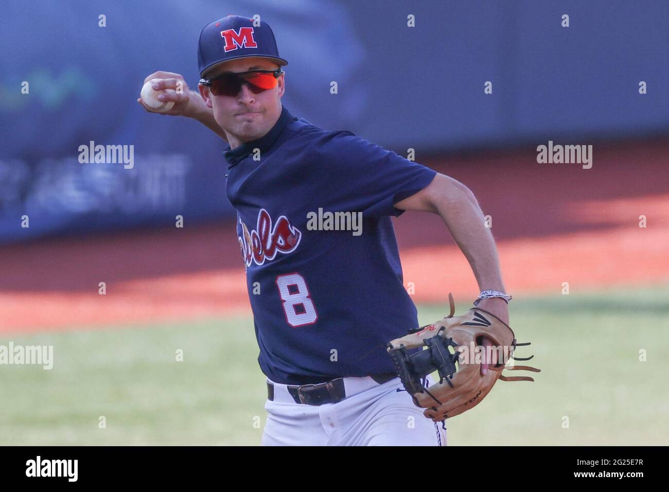 June 07, 2021: Ole Miss infielder Justin Bench (8) throws back to first ...