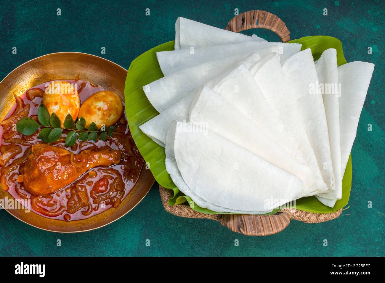 Nice Pathiri with chicken curry , malabar special food made using rice ...