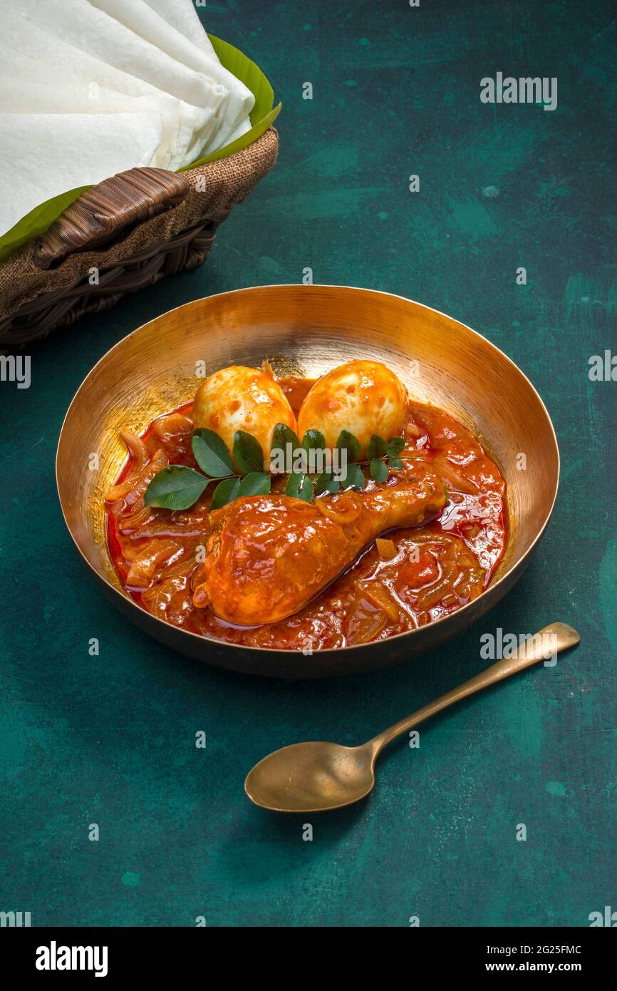 Nice Pathiri with chicken curry , malabar special food made using rice ...