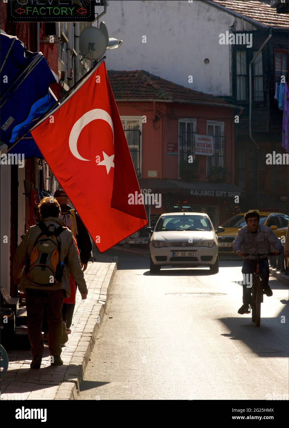 Turkish street with backlit Turkish flag, Istanbul, Turkey Stock Photo ...