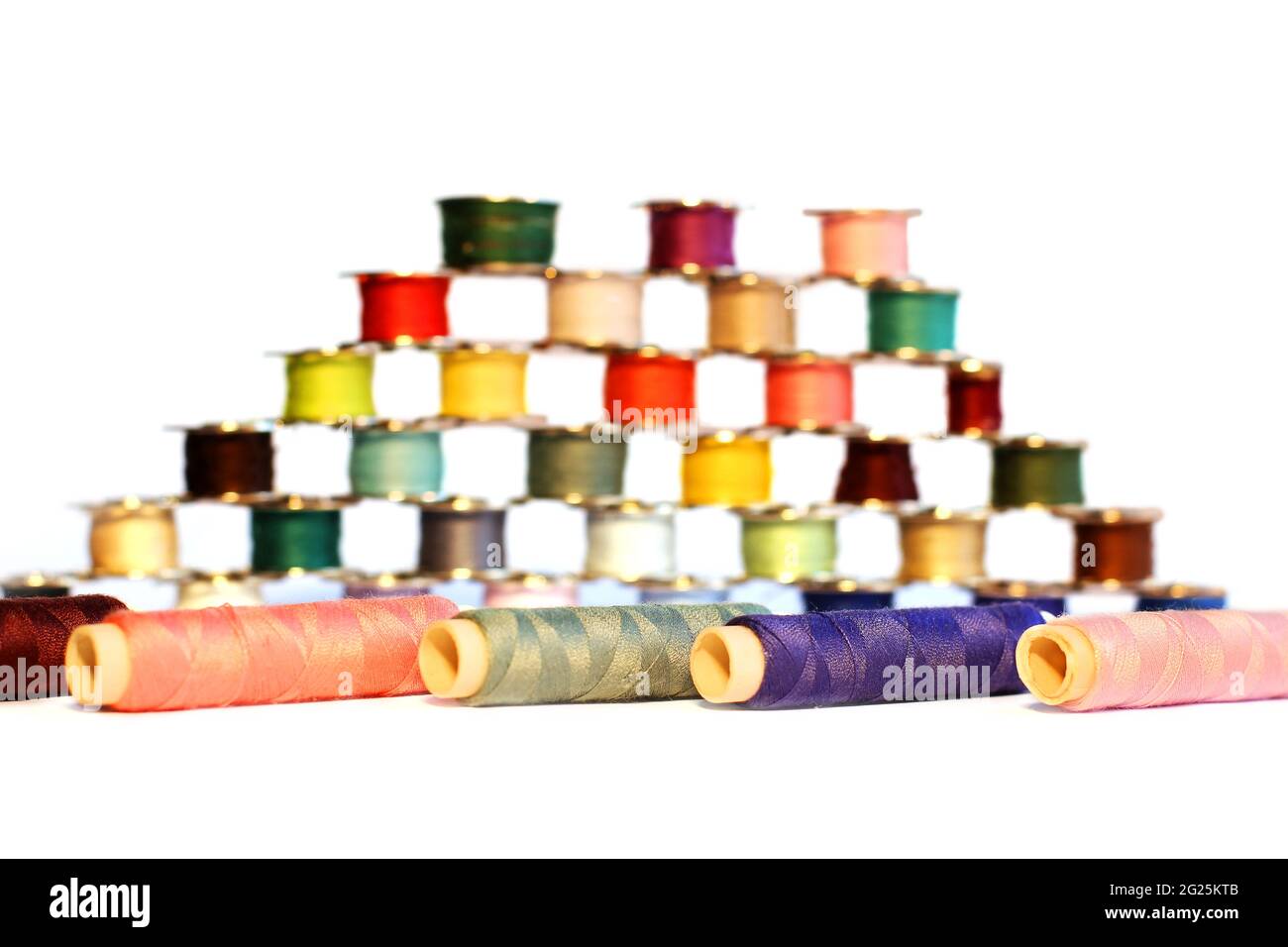 Spools of thread on a white background. For sewing Stock Photo - Alamy