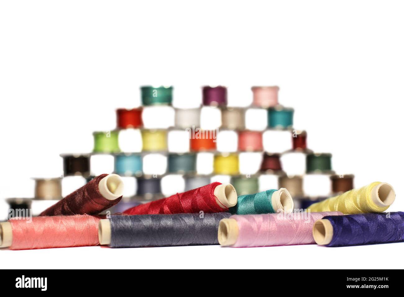 Spools of thread on a white background. For sewing Stock Photo - Alamy