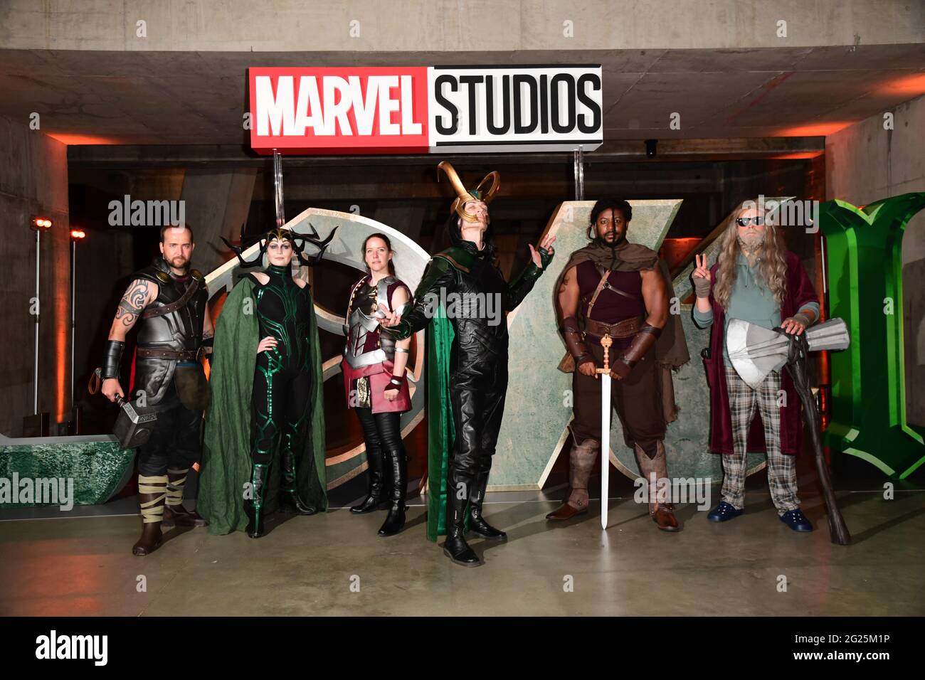 People dressed as Marvel characters during a photocall for Disney's ...