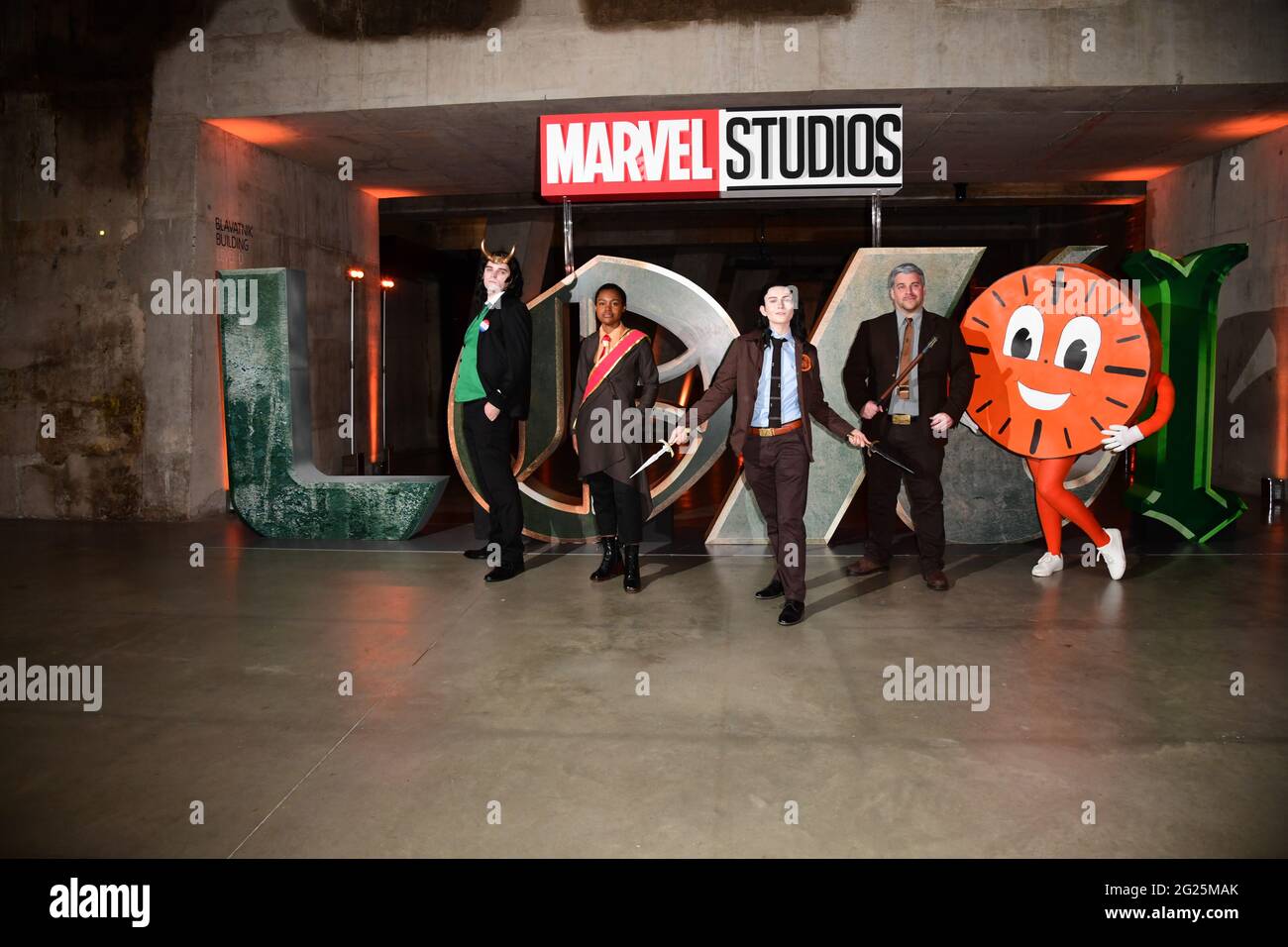 People dressed as Marvel characters during a photocall for Disney's ...