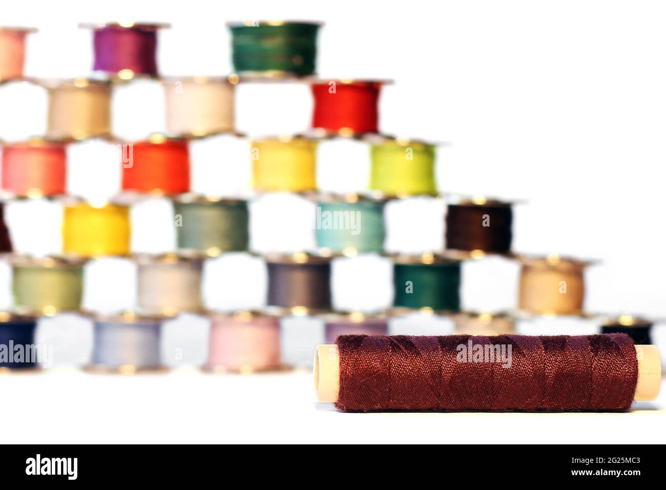 Spools of thread on a white background. For sewing Stock Photo - Alamy