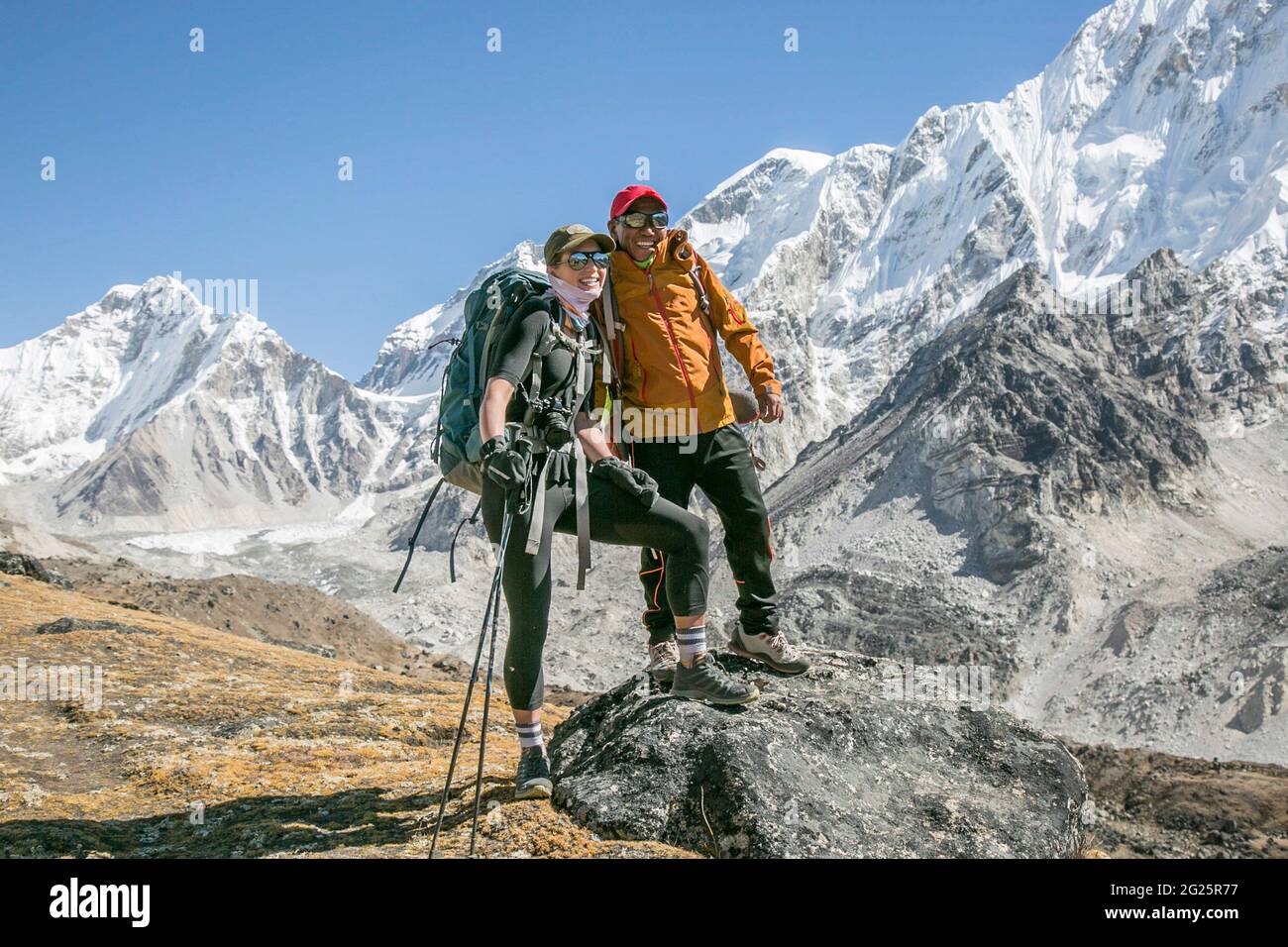 Woman climber poses with her Sherpa guide & friend en route to Everest ...
