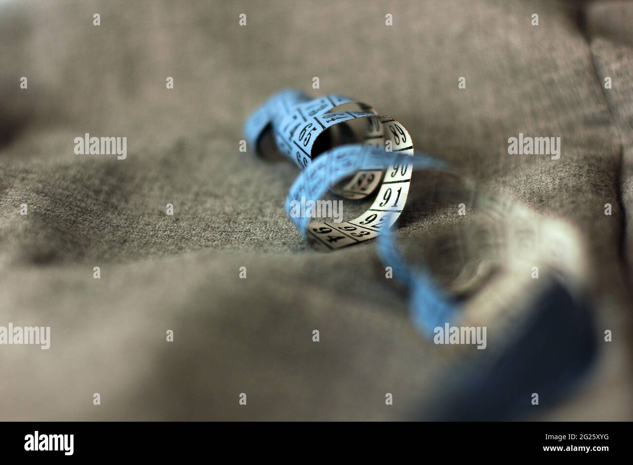 Meter for sewing close up. Meter on fabric Stock Photo - Alamy