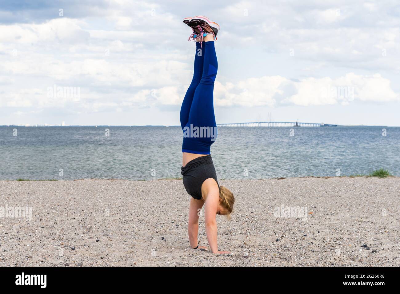 Hand stand beach hi-res stock photography and images - Alamy