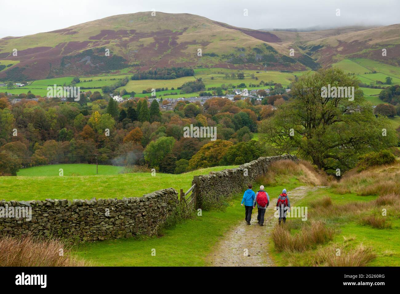 Walks heading towards the village of Sedbergh Stock Photo - Alamy