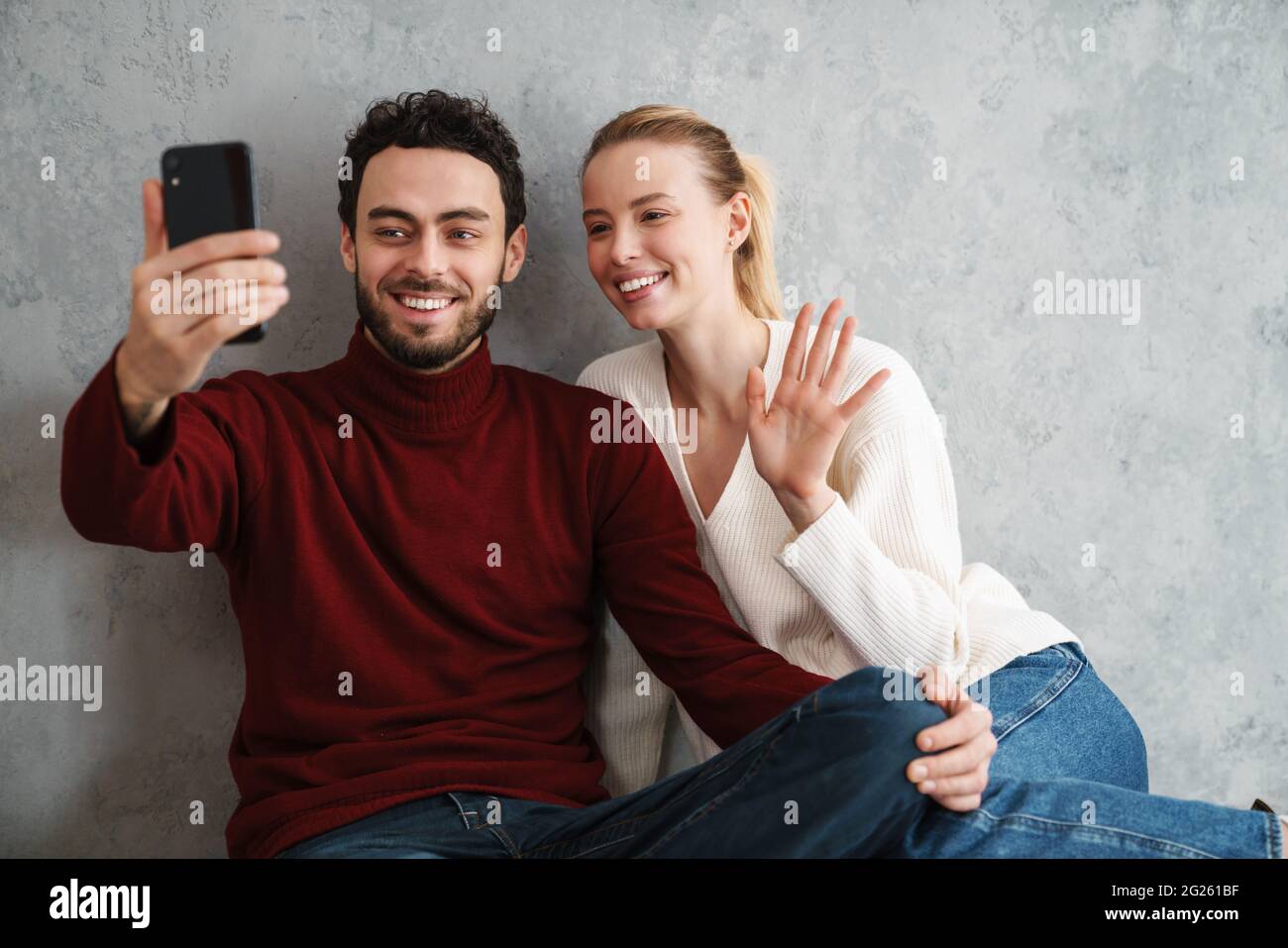 Happy couple taking selfies hi-res stock photography and images - Alamy