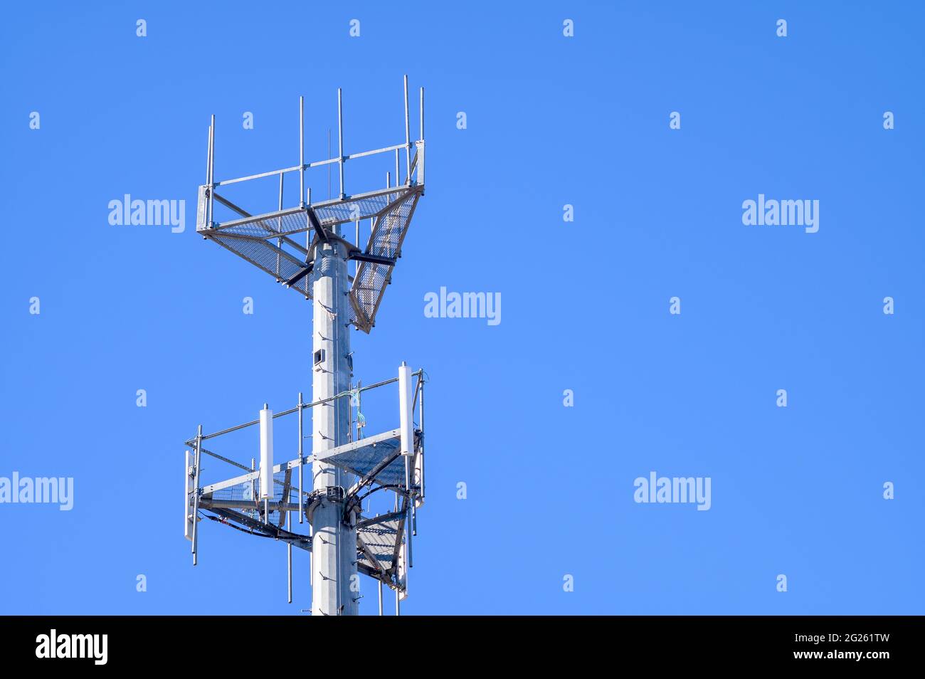 telecommunication towers with blue sky Stock Photo - Alamy