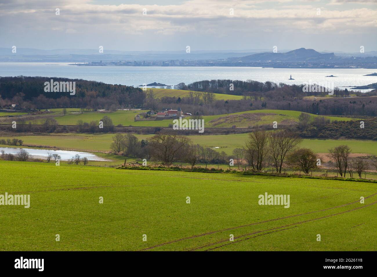 Arthur's Seat and Edinburgh seen across the fields of Fife Stock Photo ...