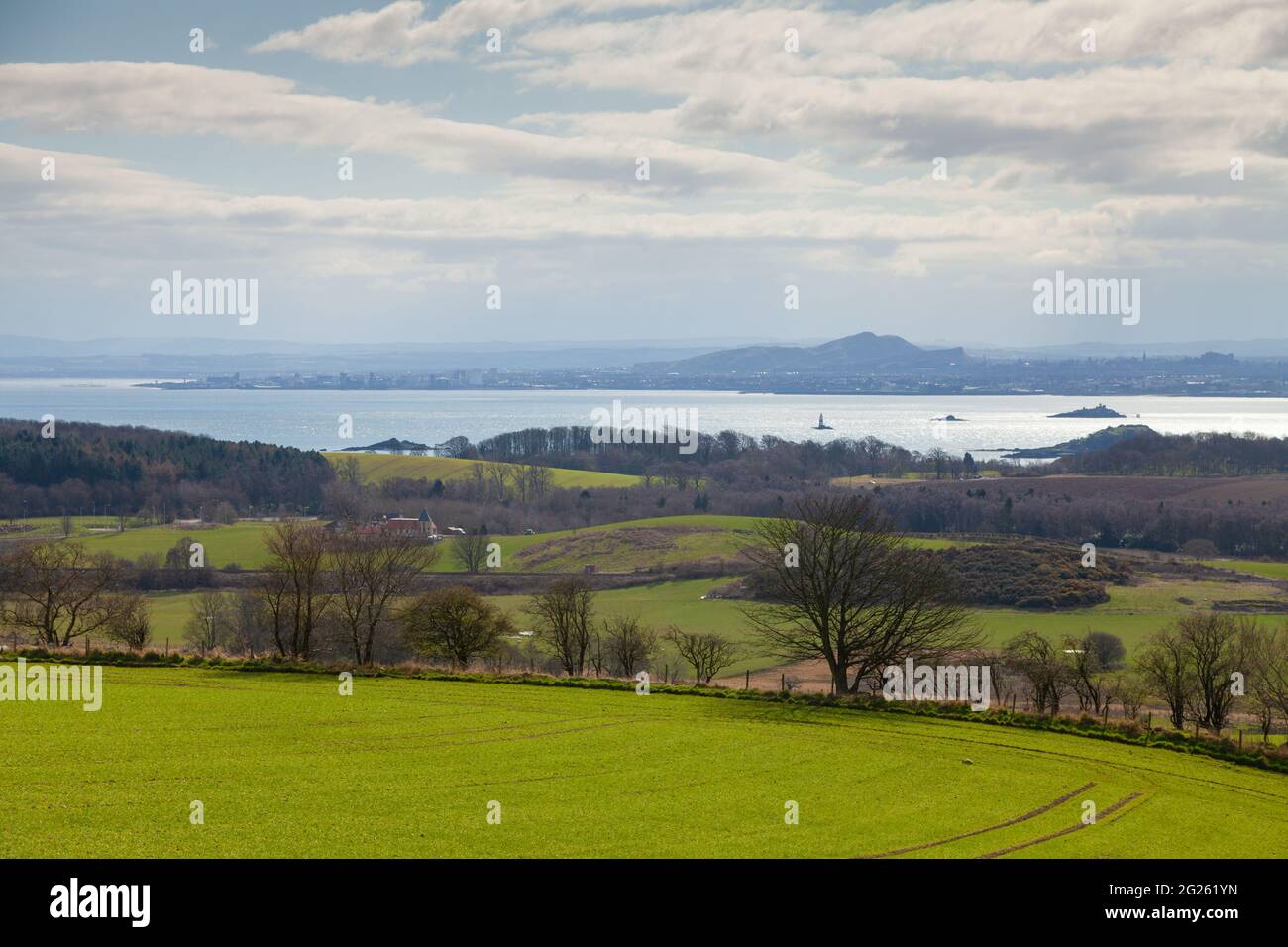 Arthur's Seat and Edinburgh seen across the fields of Fife Stock Photo ...