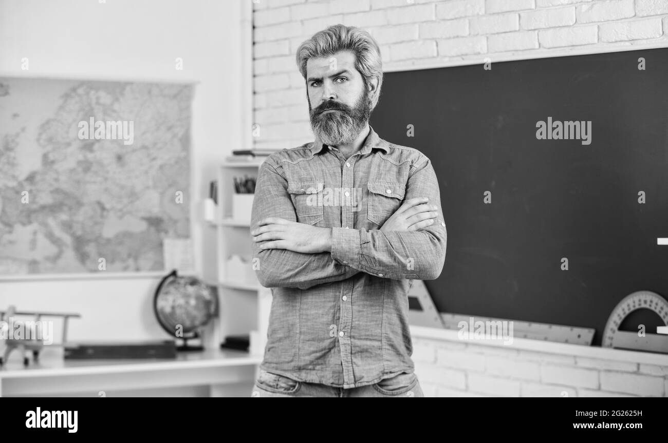 Science and education. teacher of geography. man stand at blackboard ...