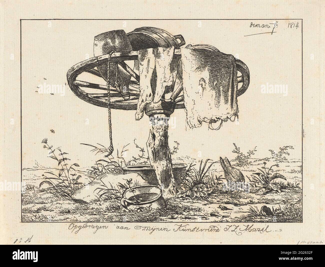 Wheel on a pole. A wagon wheel on a tree trunk, with it's garments, a ...