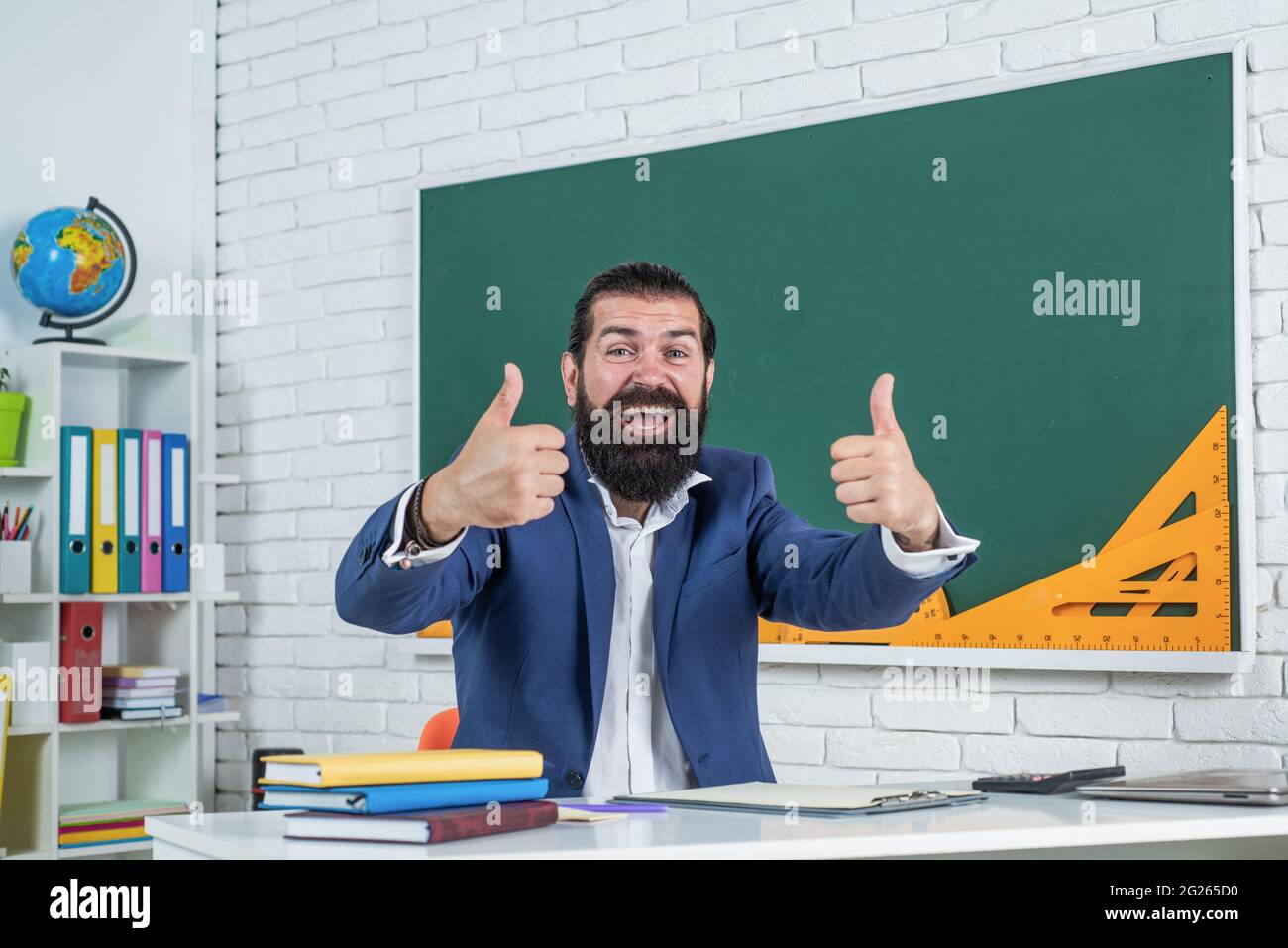 man with beard and moustache look as businessman or teacher in college ...