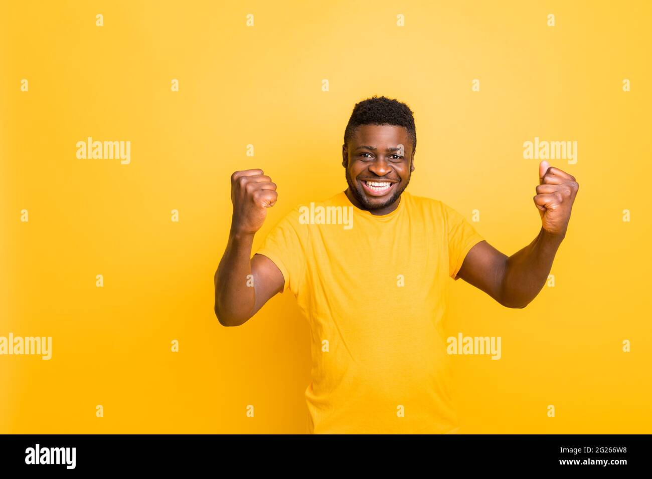 Excited overjoyed young triumphant male, winner looking at camera ...