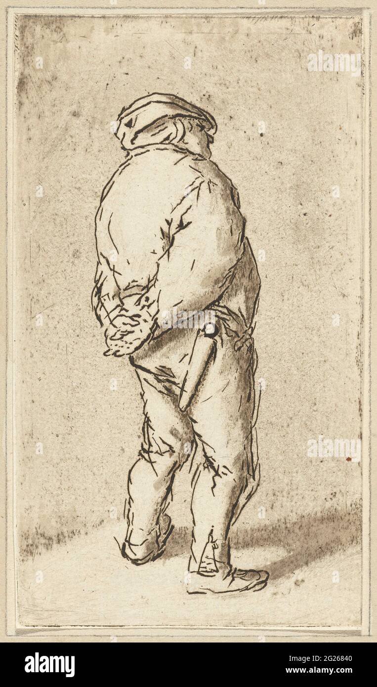 Standing man. A standing man with a cap on the head and his hands on ...