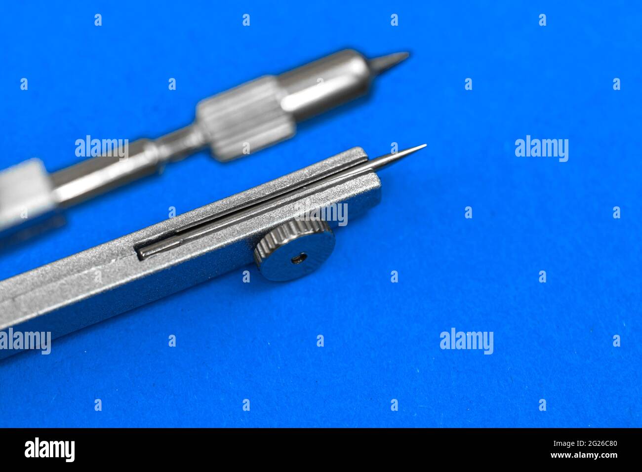 Macro photo of drawing compass divider for geometry Stock Photo - Alamy