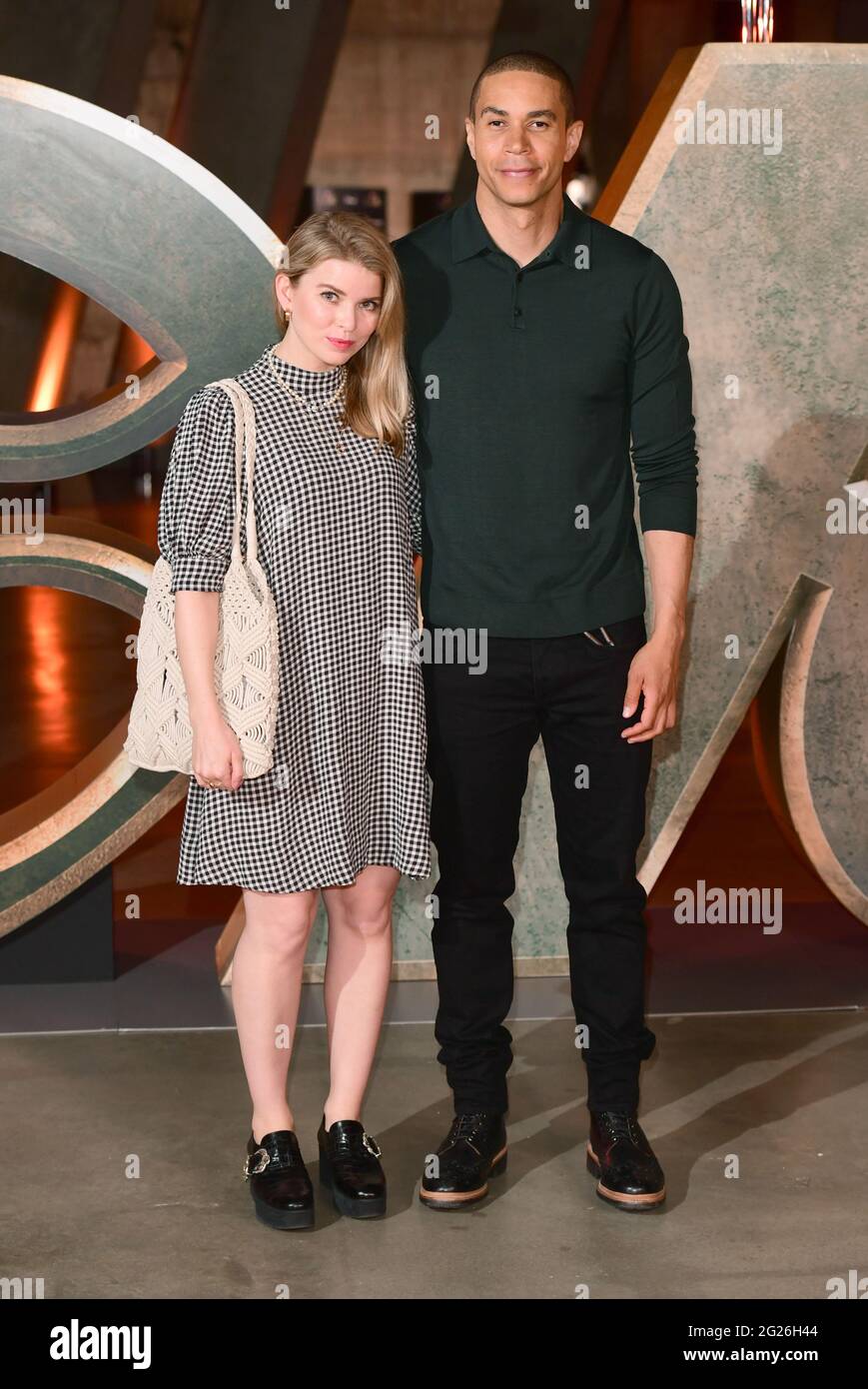 John Macmillan (R) and guest attend a photocall for Disney's Loki in ...