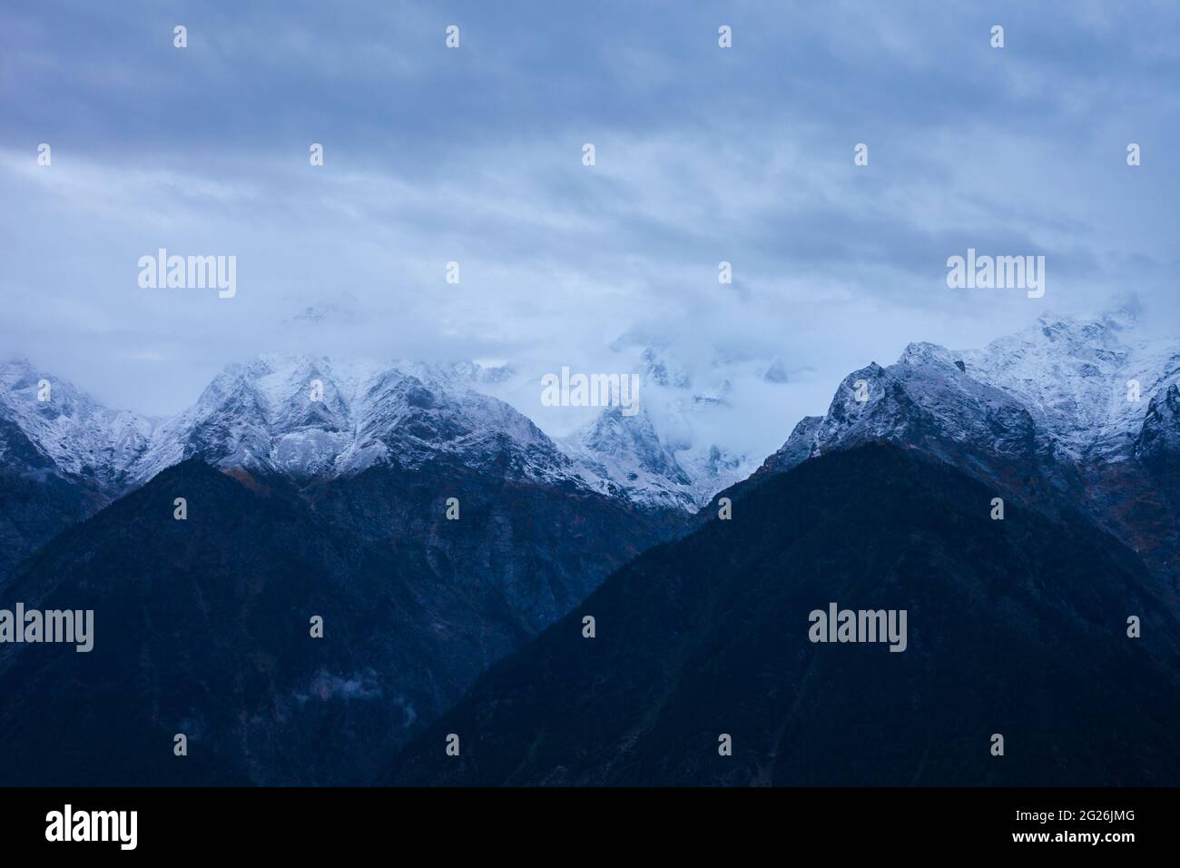 Kinnaur Kailash mountain aerial panoramic view from Kalpa. Kalpa is a ...