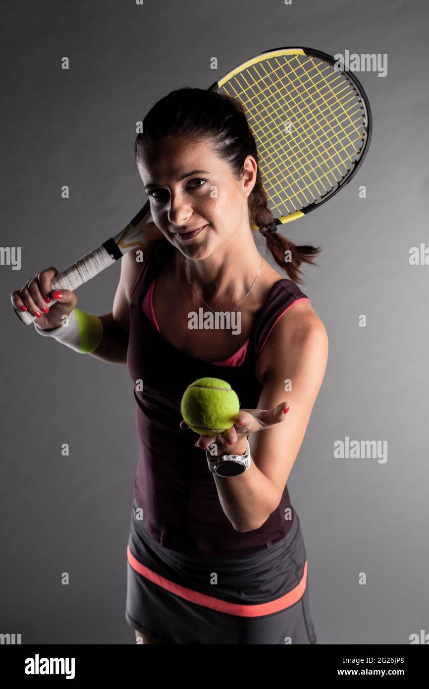 Professional female tennis player. Girl with racket and ball Stock ...