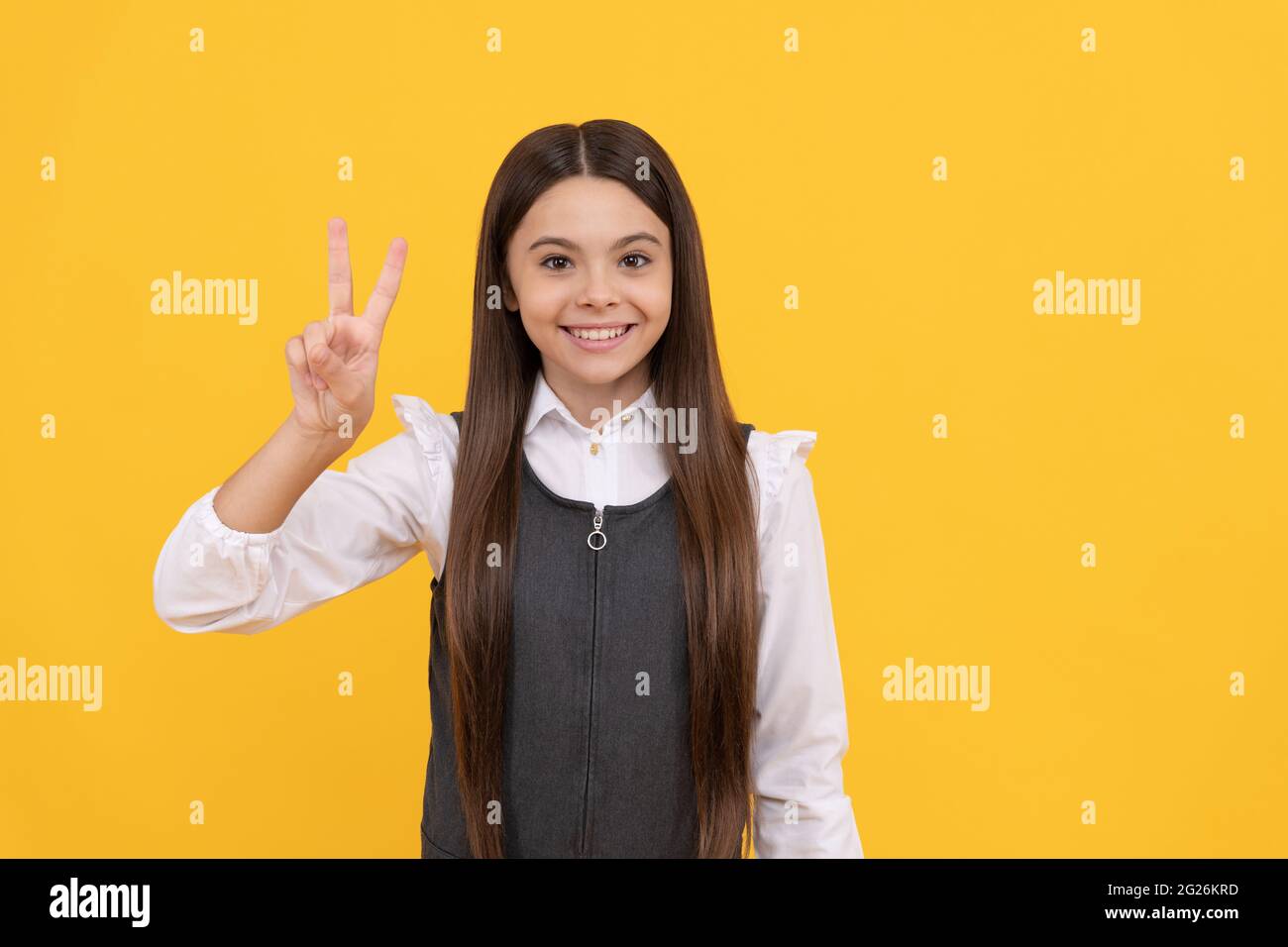 V is for victory. Happy girl child give Victory sign. School education ...