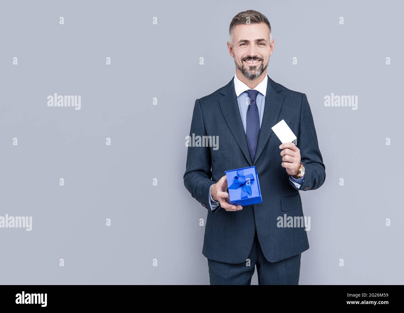 happy ceo share gift certificate. handsome man prepare for romance date ...