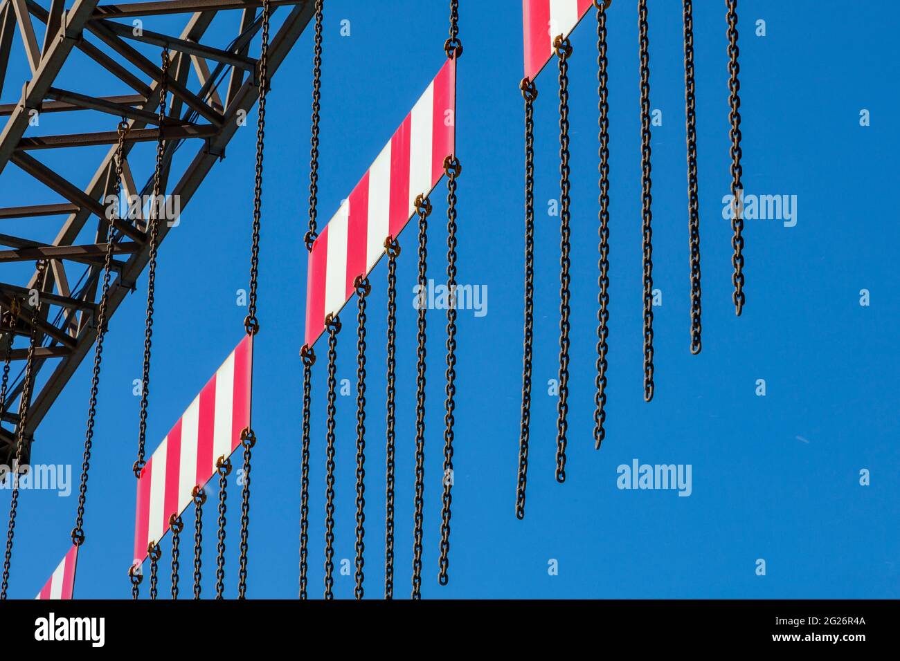 Long steel chains hang in rows to indicate the maximum height of ...