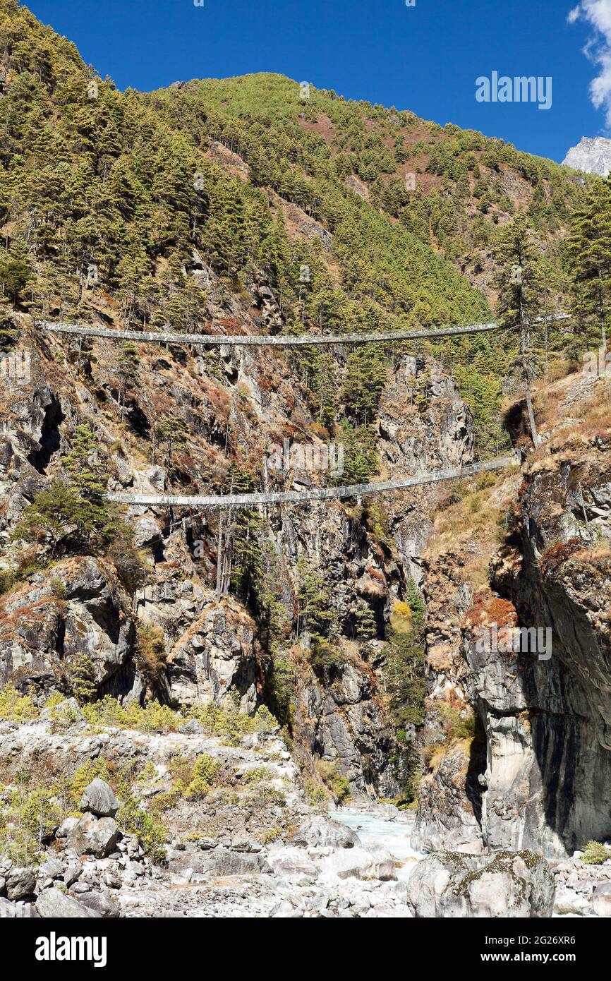 Two rope hanging suspension bridges in Nepal Himalayas under Namche ...