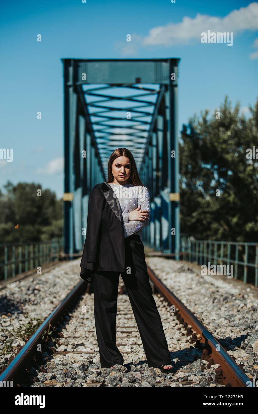 Beautiful girl on train tracks hi-res stock photography and images - Alamy