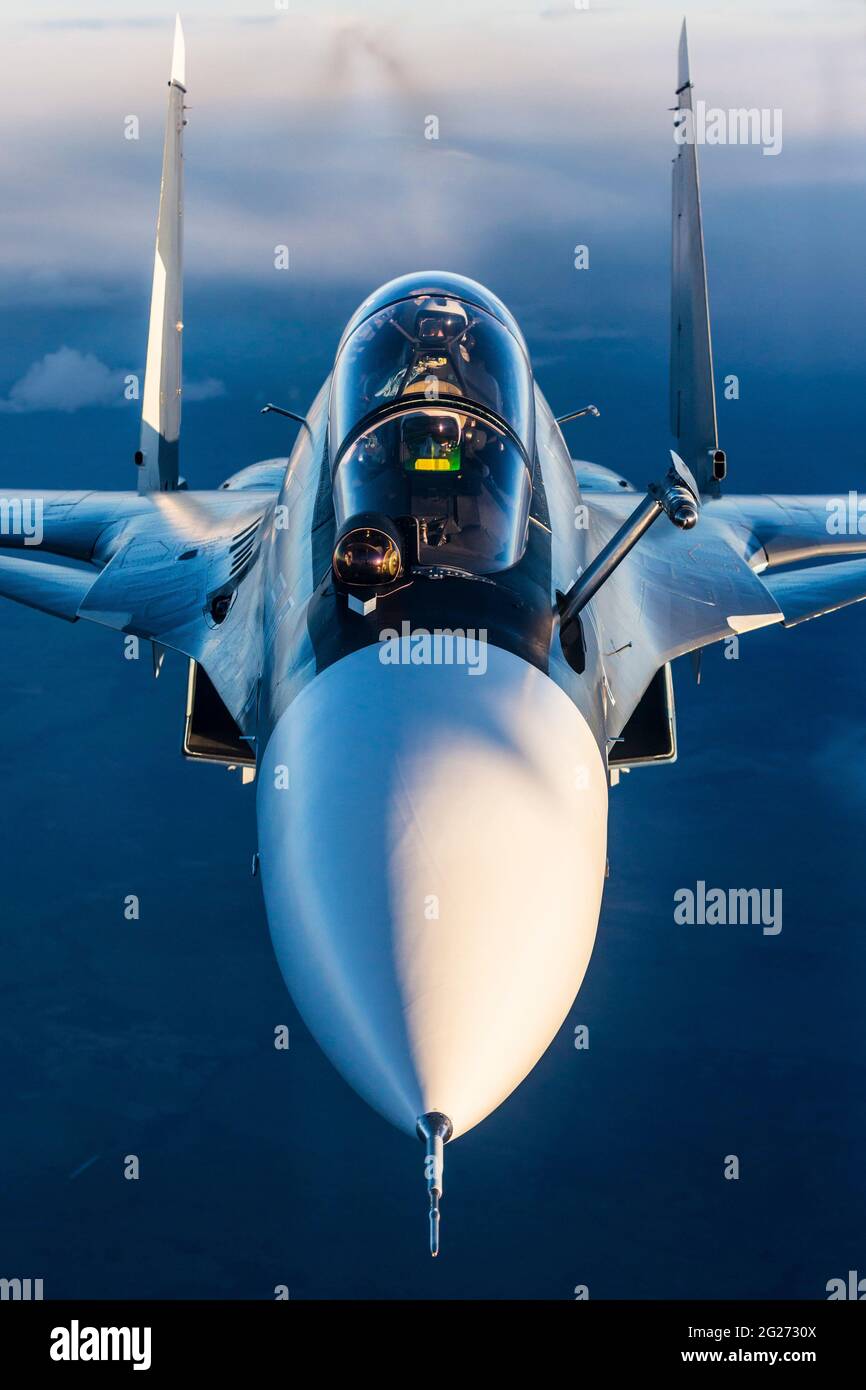 Su-30SM jet fighter of the Russian Navy flying behind a refueling ...