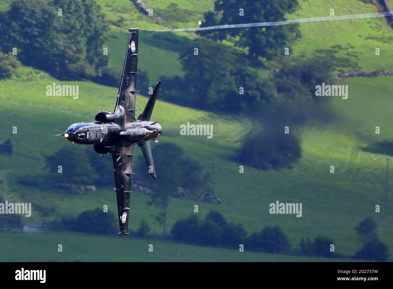 A Hawk T2 training aircraft of Royal Air Force during a training flight ...