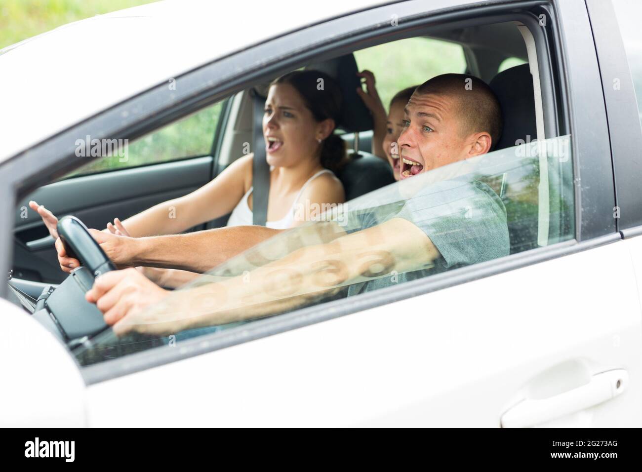 Shocked family frightened of accident during driving Stock Photo - Alamy