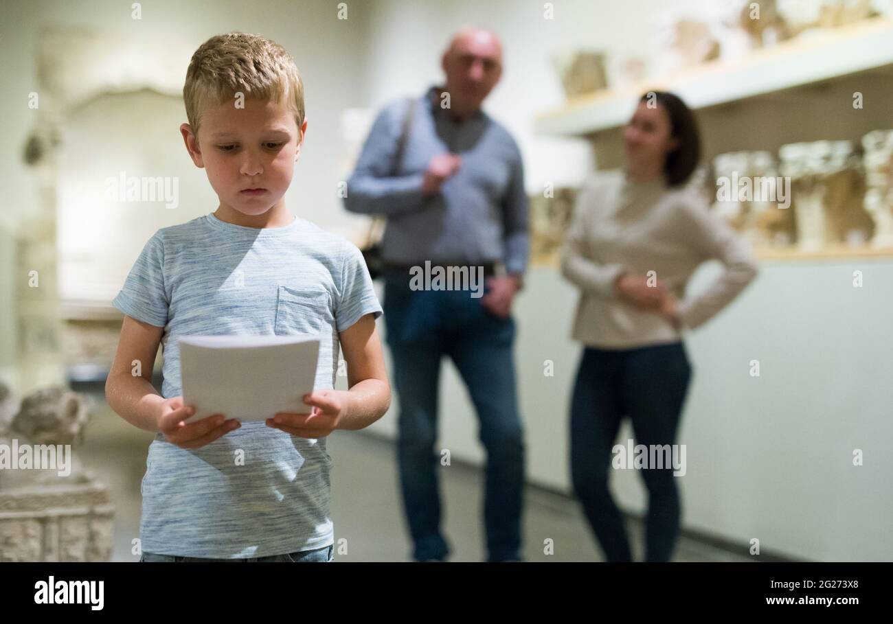 Family visiting museum Stock Photo - Alamy