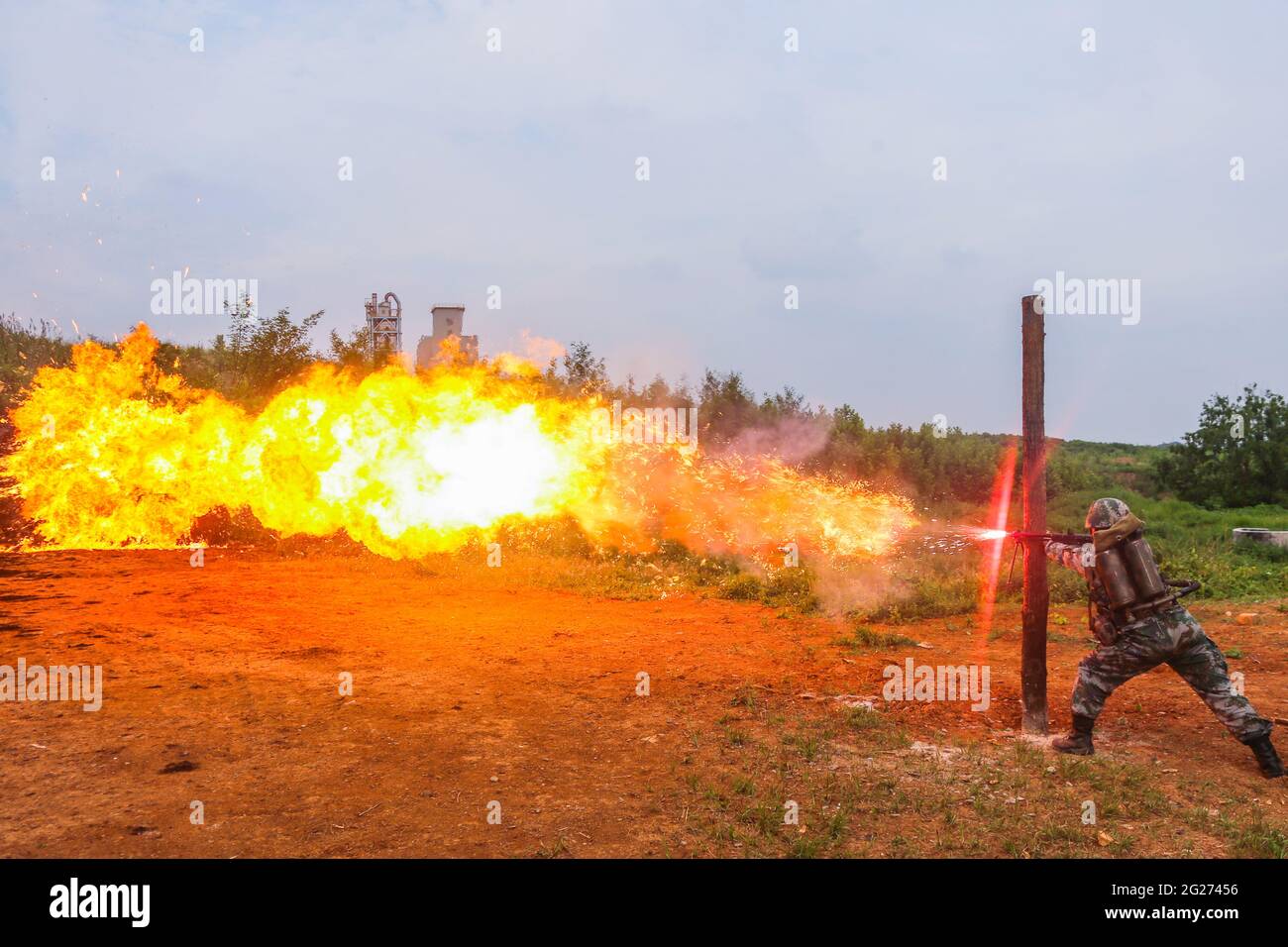 JIANGSU, CHINA - JUNE 8, 2021 - A soldier conducts a fire breathing ...