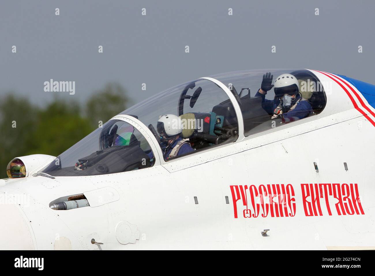 Pilots in the cockpit of a Su-30SM jet fighter of the Russian Knights ...