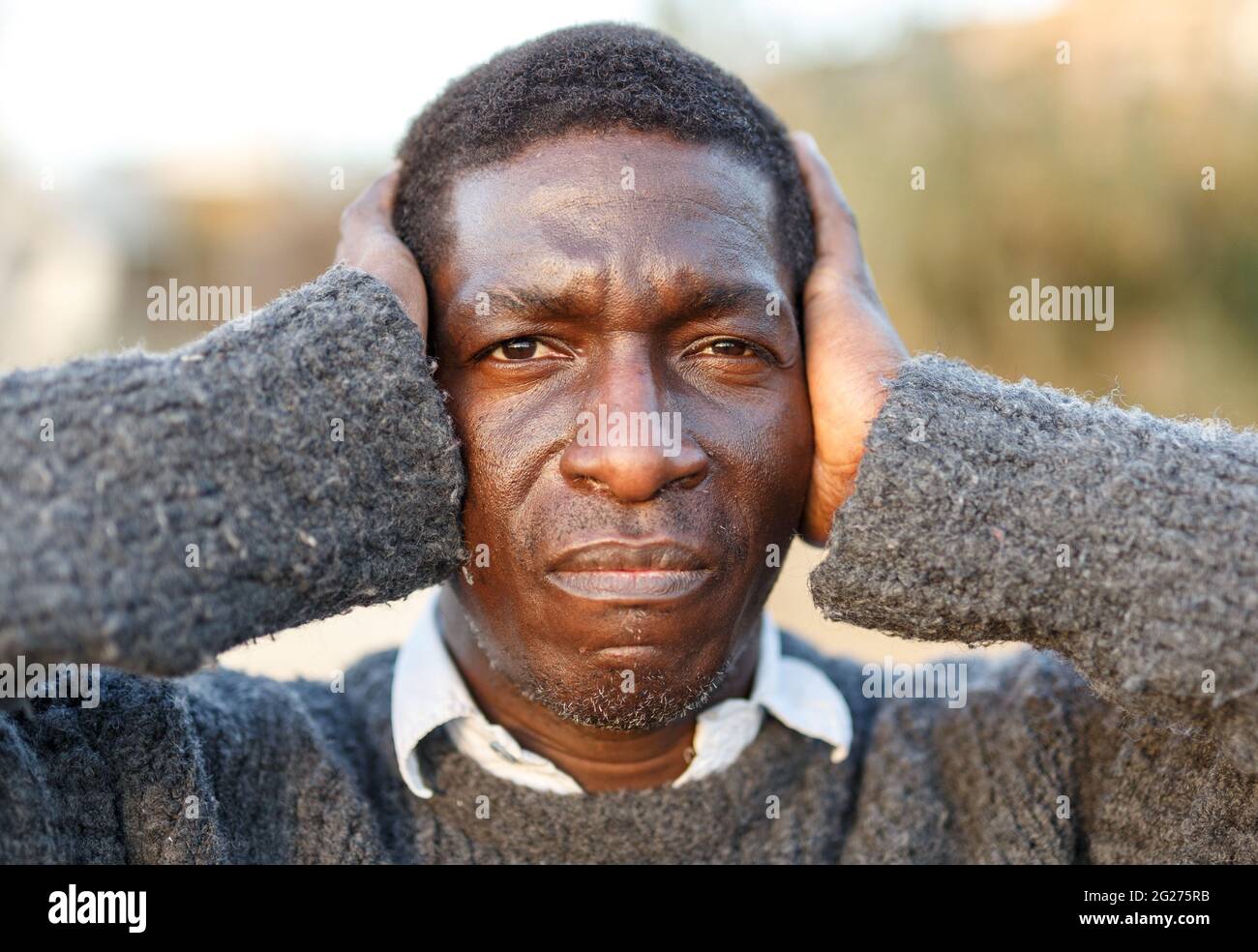 Portrait of confused African man Stock Photo - Alamy