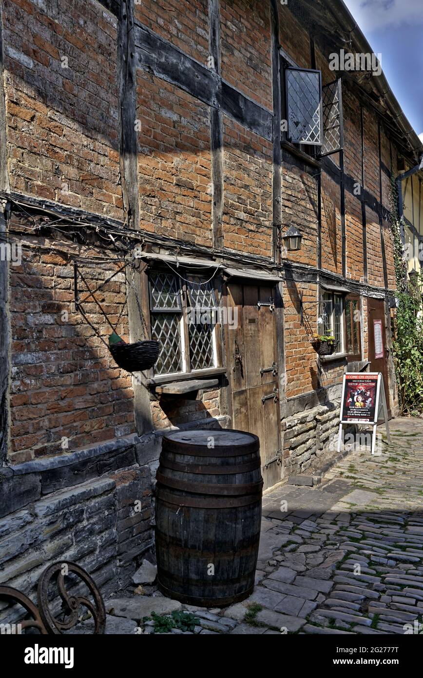 Tudor World museum with 16th century cobblestone alleyway and half ...