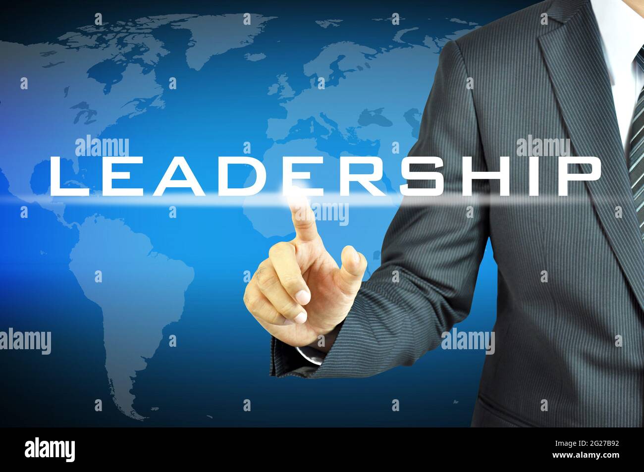 Businessman touching LEADERSHIP sign on virtual screen Stock Photo - Alamy