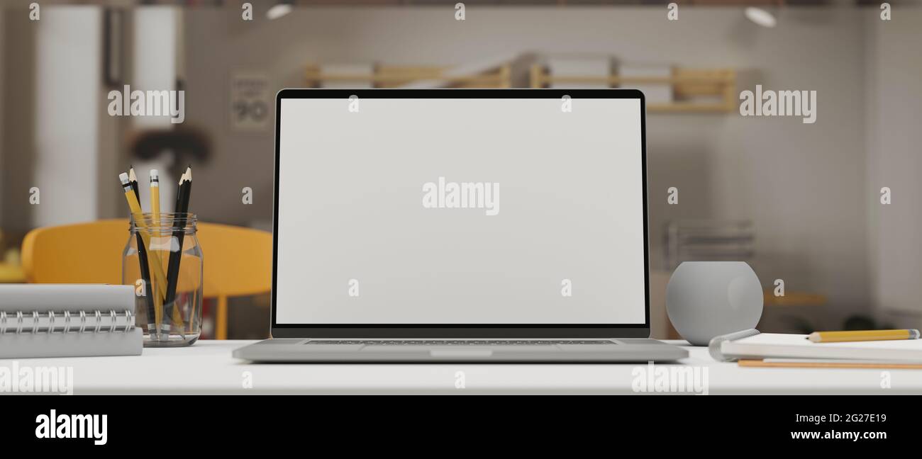 Computer laptop with mock-up screen on study table with stationery in ...
