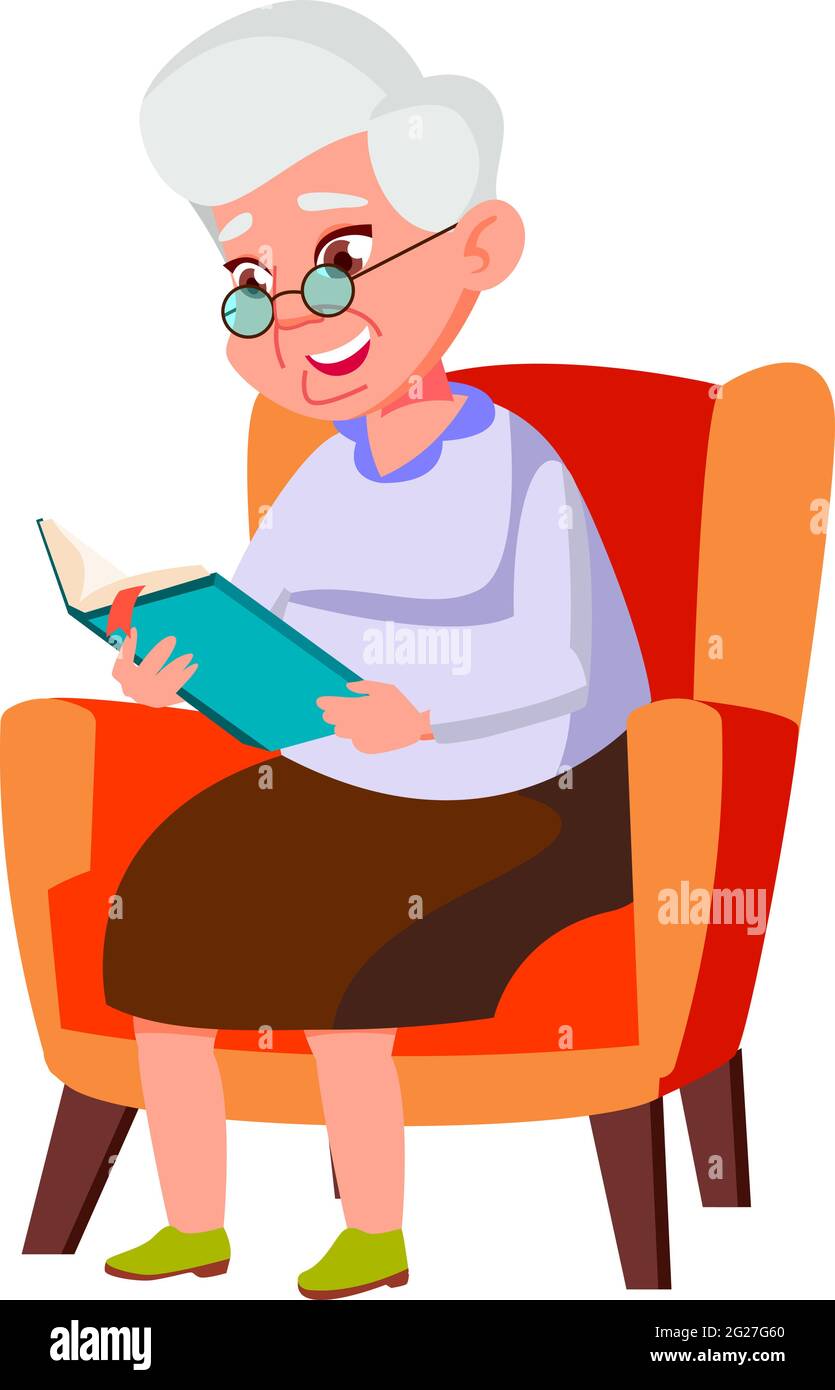 happy elderly lady sitting in living room armchair and reading ...