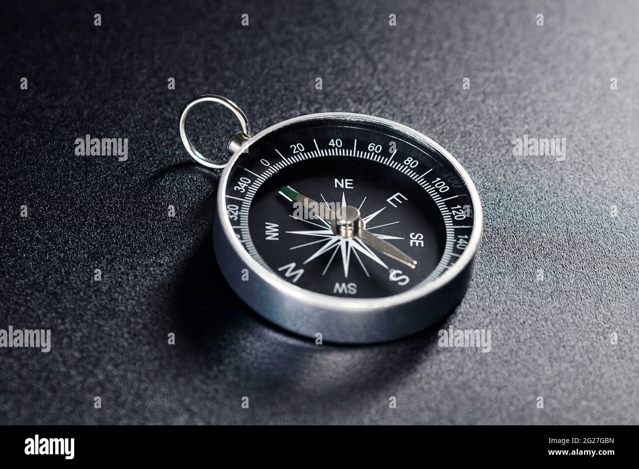 Compass On Black Background, Compass Copy Space Stock Photo - Alamy