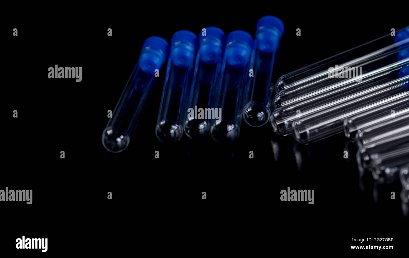 Laboratory Test Tubes on Black Background, Health care concept Stock ...