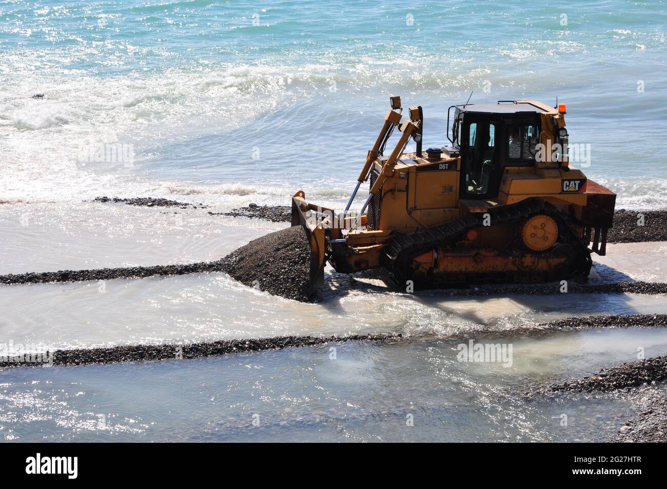 Work on the seaside with a loader in Nice Stock Photo - Alamy
