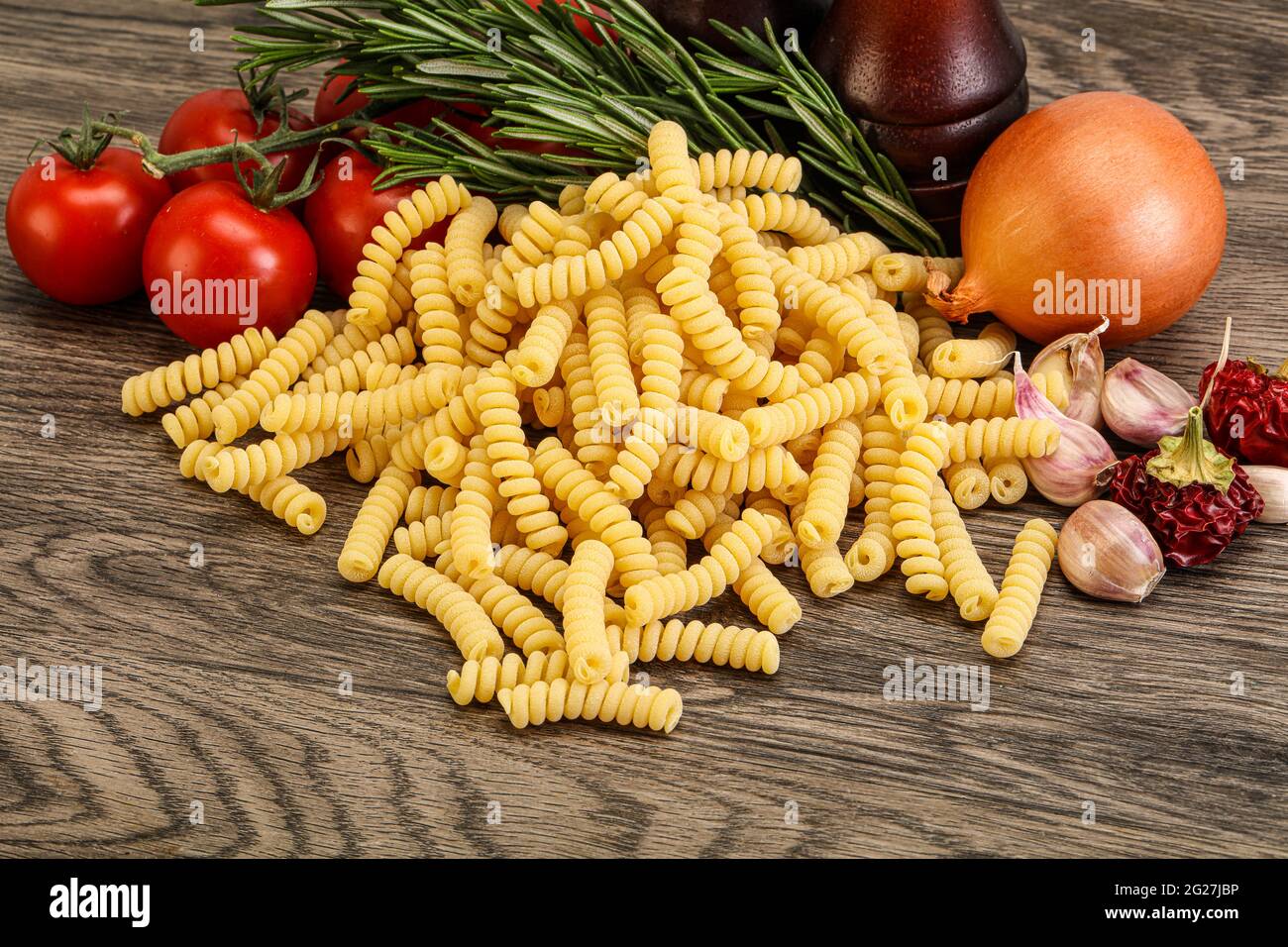 Raw Italian wheat pasta - Fusilli for cooking Stock Photo - Alamy
